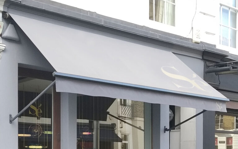Drop-Arm Canopy - Commercial Awning Company